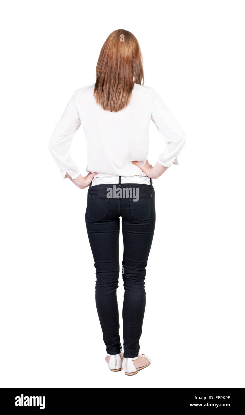 back view of standing young beautiful brunette woman. girl watching ...