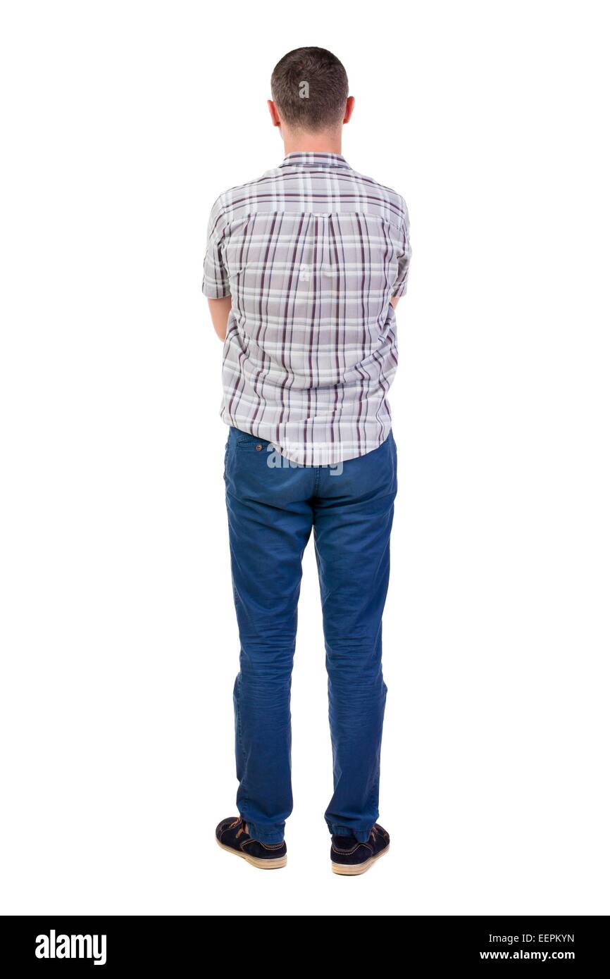 Back view of handsome man in shirt. Standing young guy in jeans. Rear ...