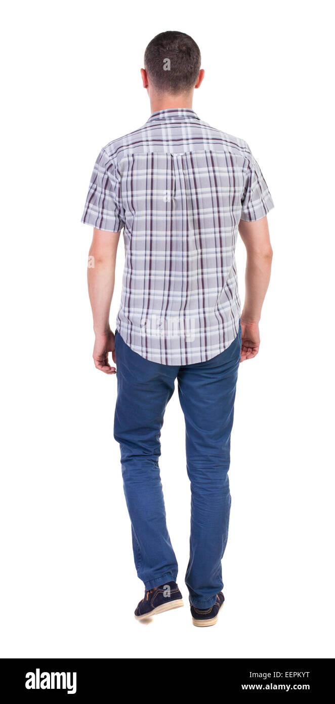 Back view of going handsome man in jeans and a shirt. walking young guy ...