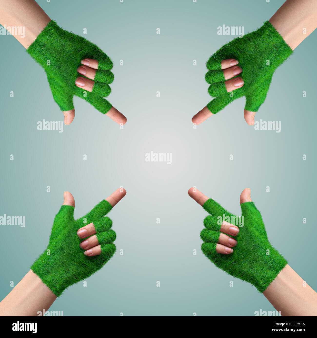 Go Green Concept Hand in glove grass indicates the direction ...