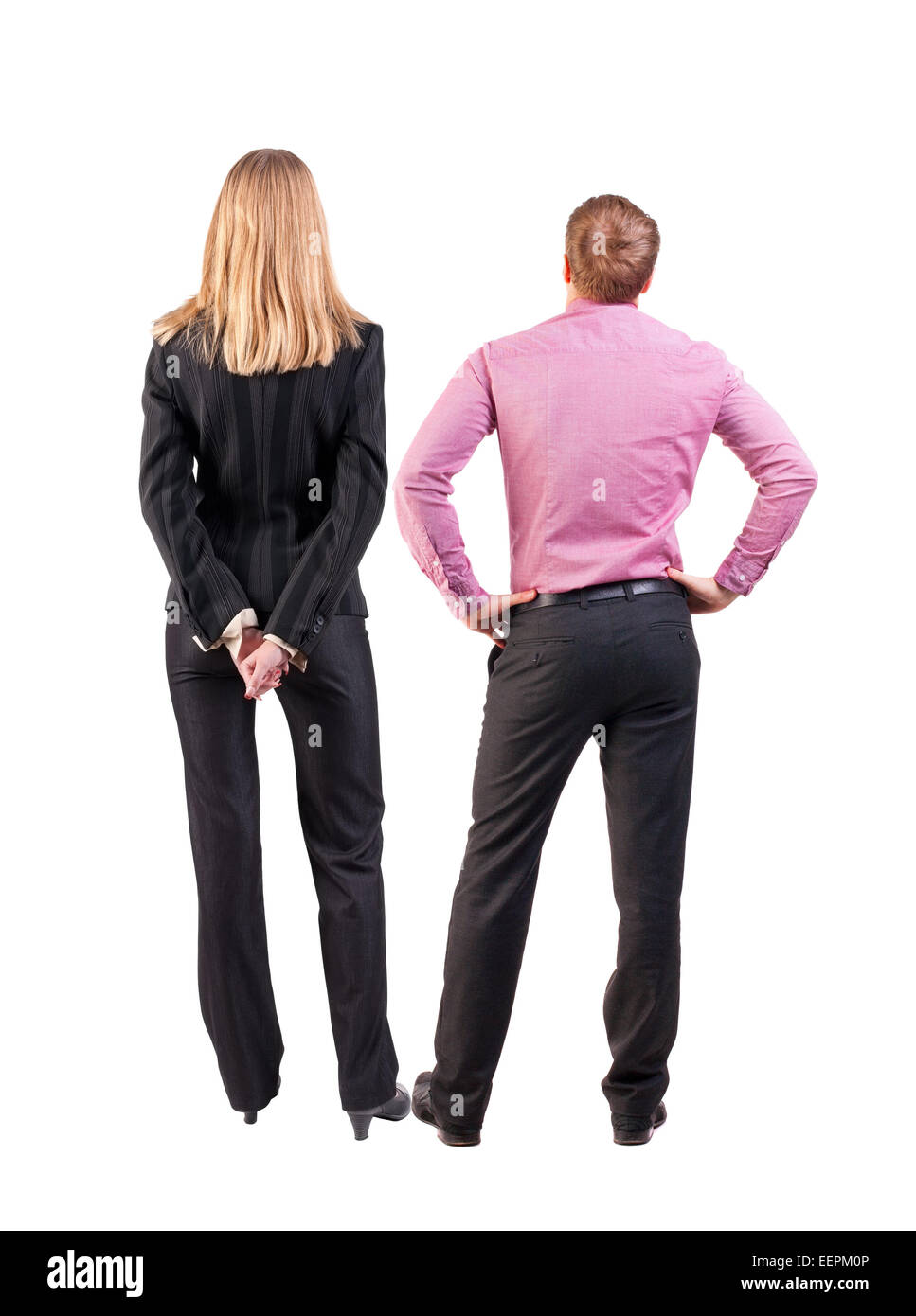Back view of young couple (man and woman) hug and look into the ...