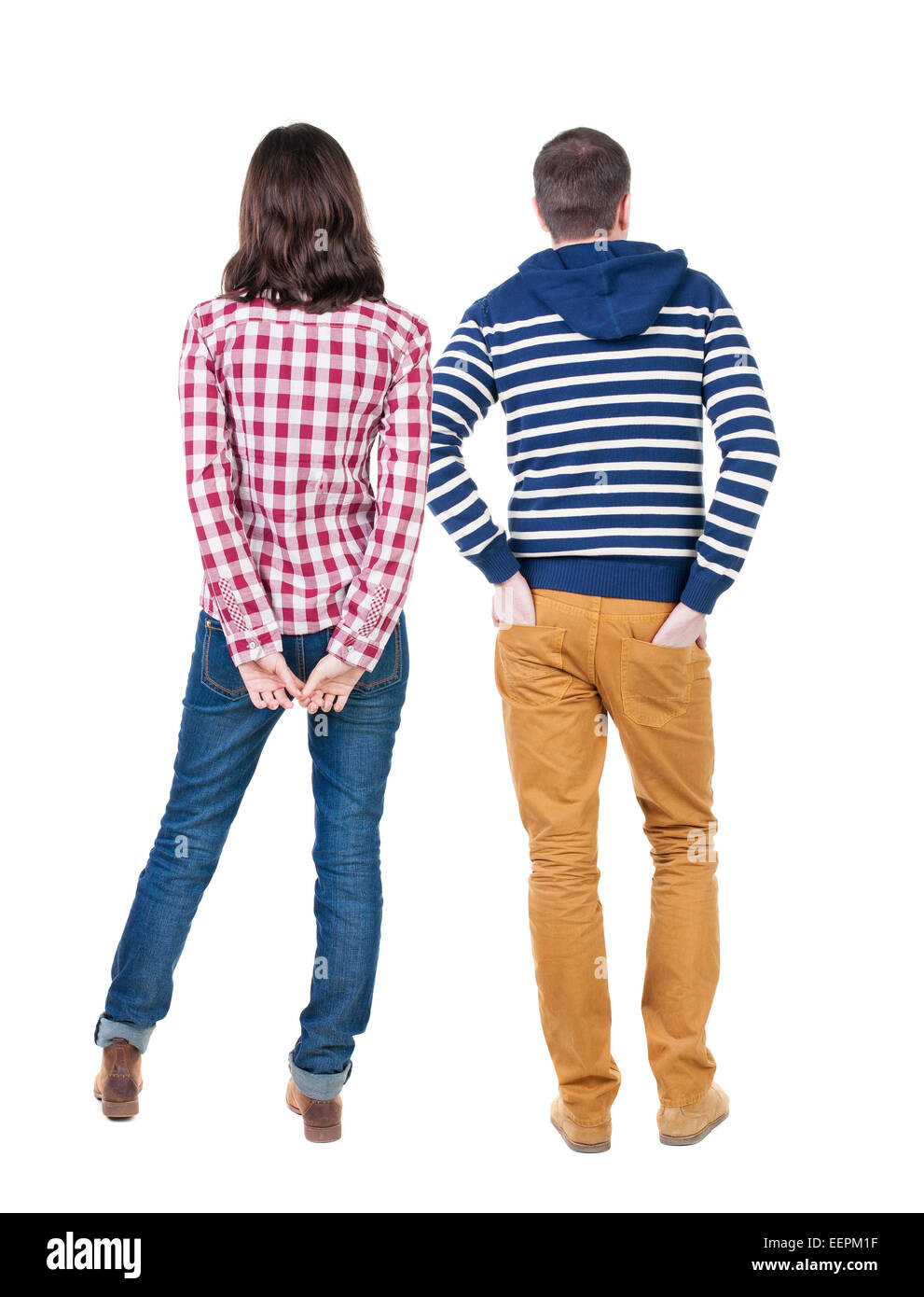 Back view of young couple (man and woman) hug and look into the ...