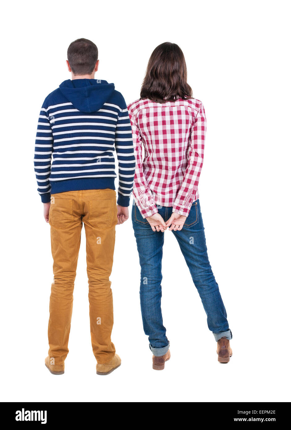 Back view of young couple (man and woman) hug and look into the ...