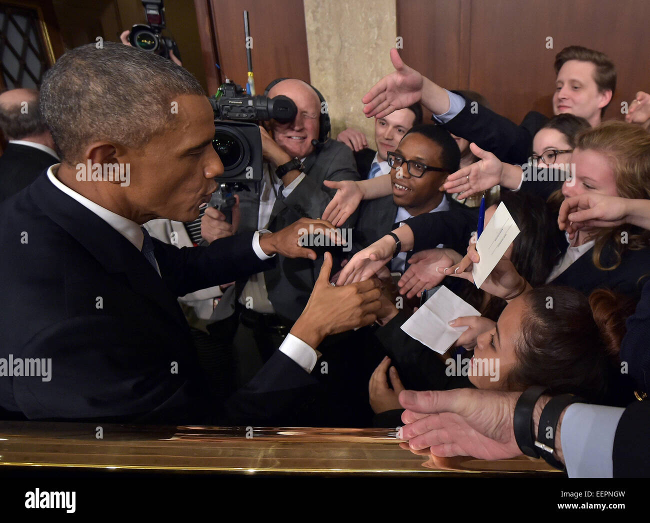 Washington DC, USA. 20th Jan, 2015. US President Barack Obama shakes ...