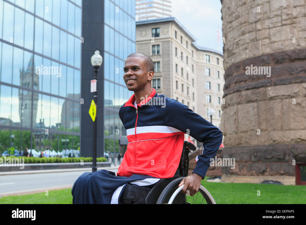 Man in wheelchair with Spinal Meningitis moving independently in the ...