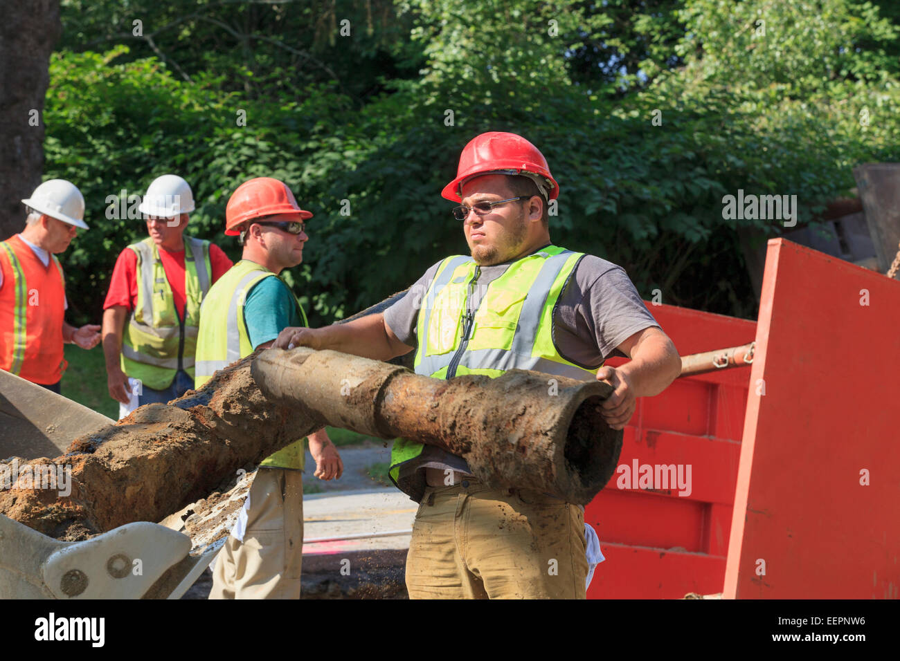 Construction worker with bucket hi-res stock photography and images - Alamy