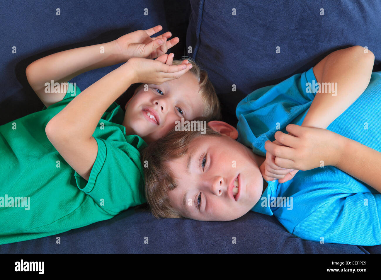 Boys with hearing impairments signing 'family' in American sign ...