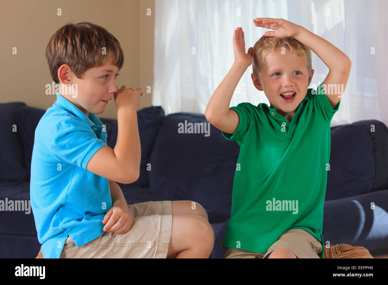 Boys with hearing impairments signing in American sign language on ...