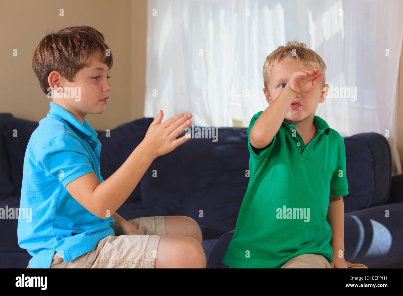Boys with hearing impairments signing in American sign language on ...