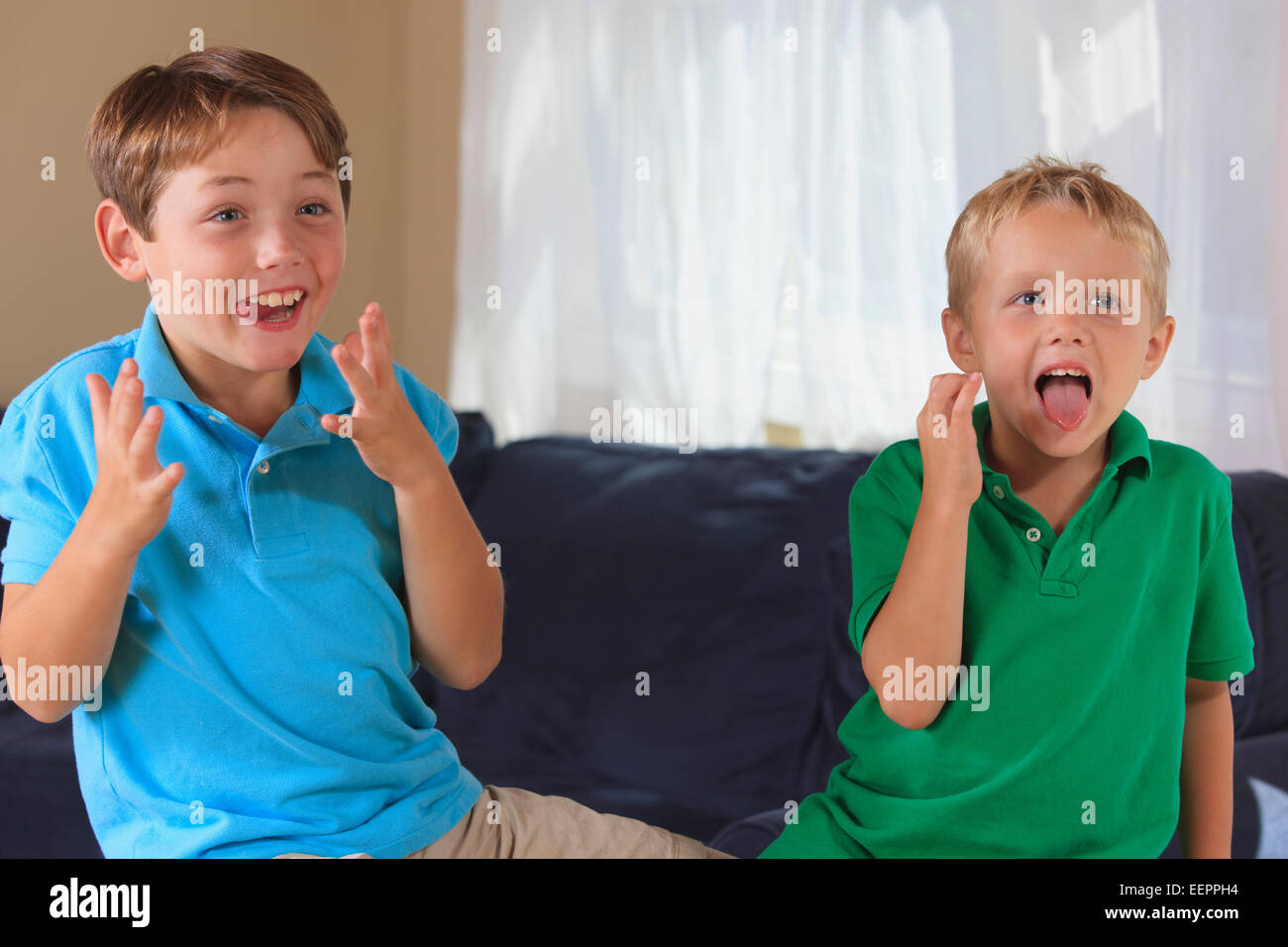 Boys with hearing impairments signing in American sign language on ...