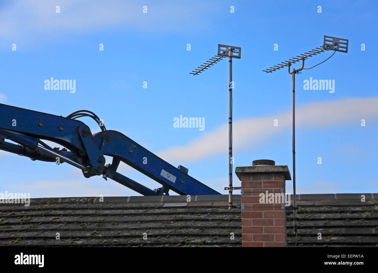 An extended hydraulic arm for piping concrete over a building to an ...