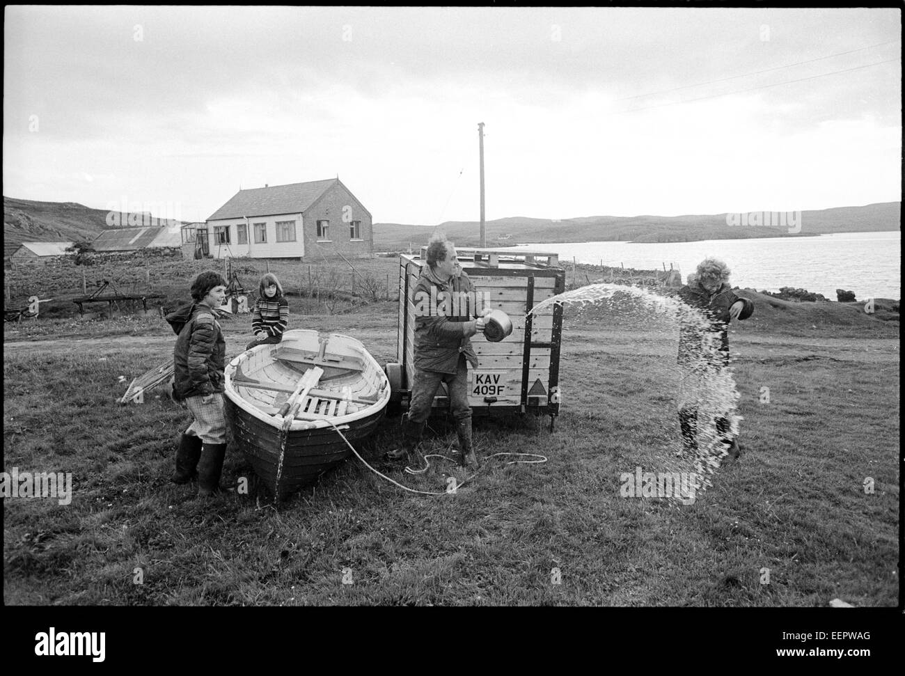 Children playing outdoors with family Black and White Stock Photos ...