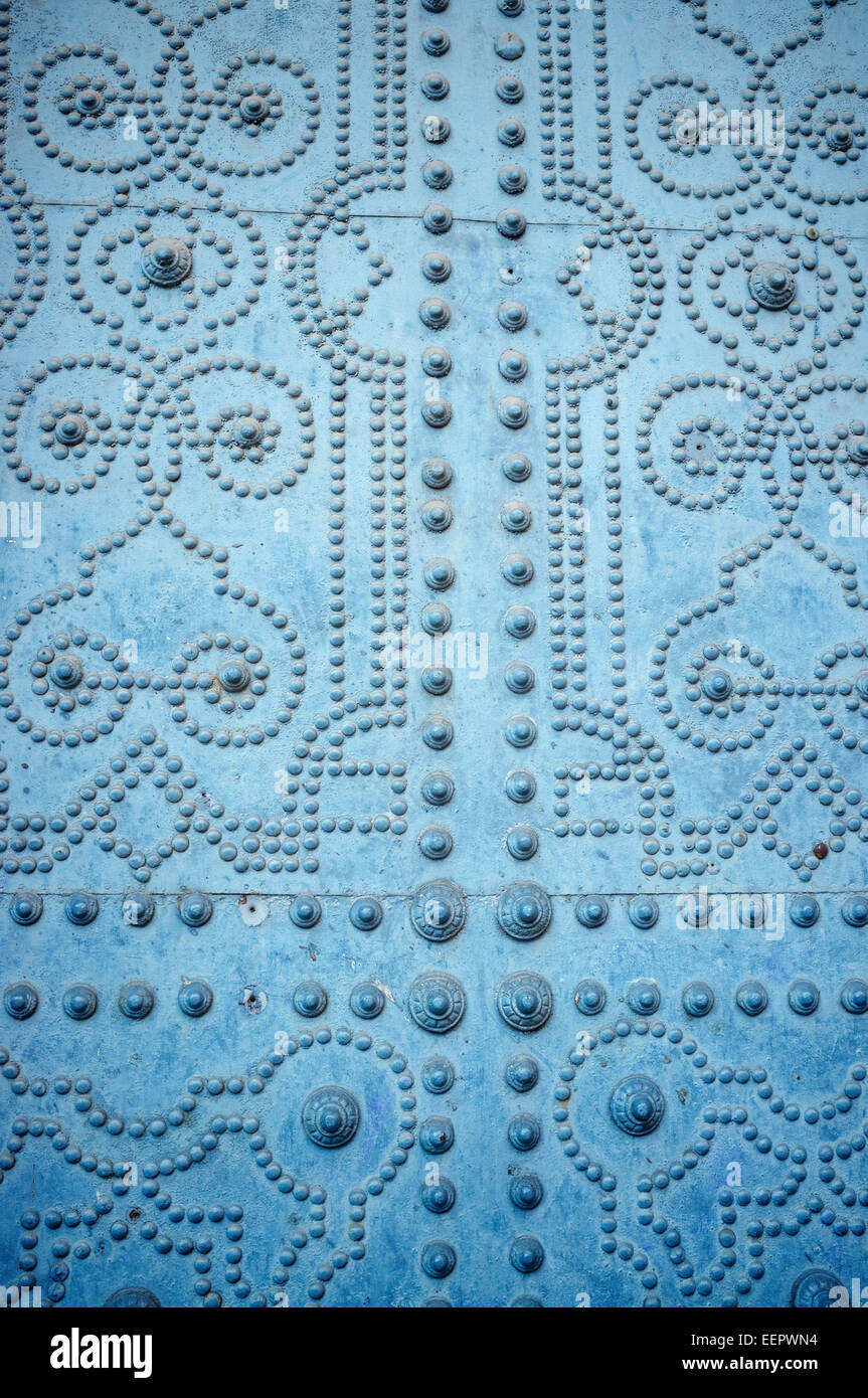 Detail take of an old door studded with geometric motives Stock Photo ...