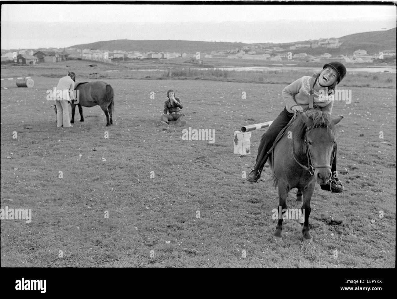 Three people riding horses Black and White Stock Photos & Images - Alamy
