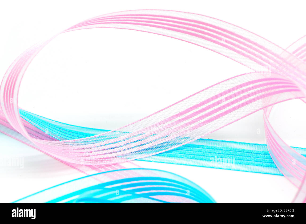 Blue and pink ribbon, isolated on a white background Stock Photo - Alamy