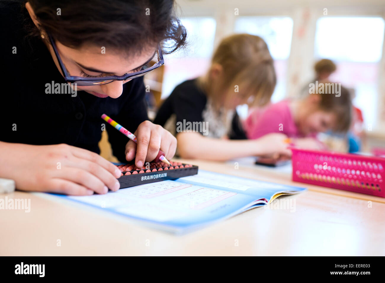children in school working with mathematics Stock Photo - Alamy