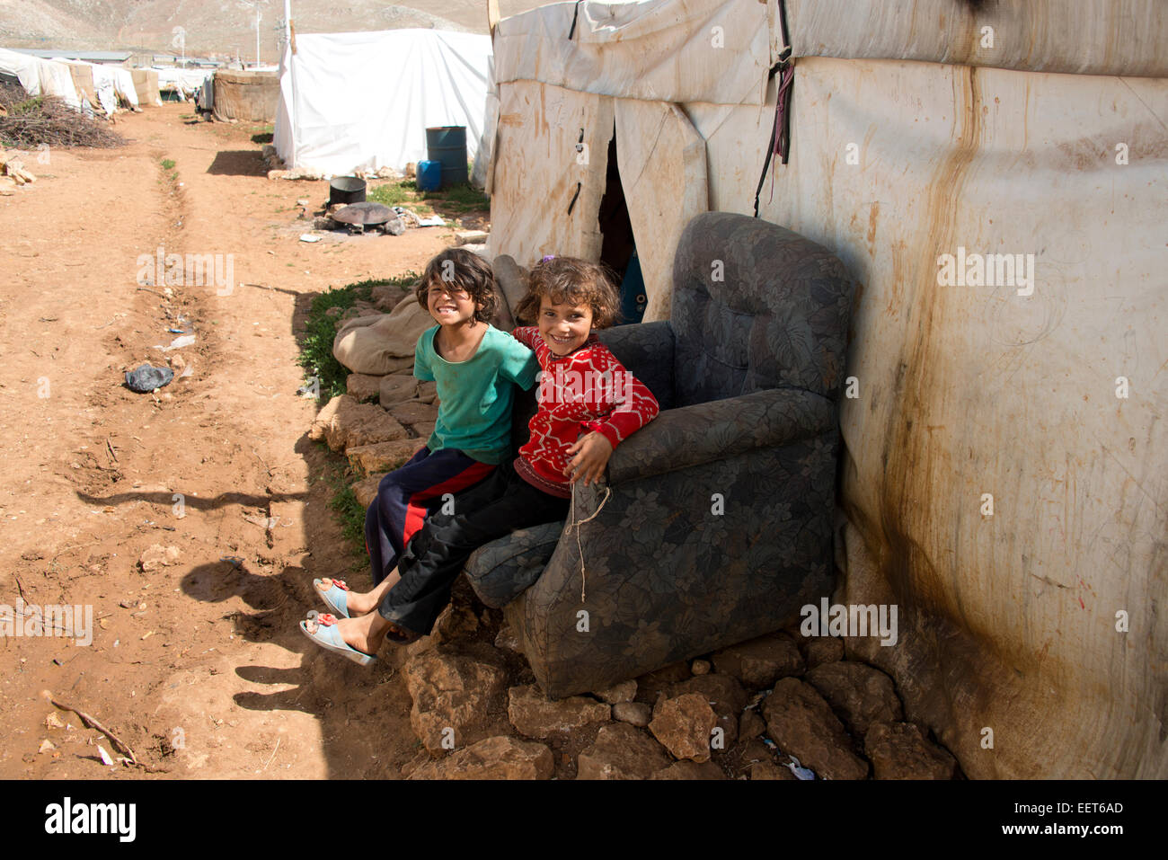 Smiling syrian refugee children in camp hi-res stock photography and ...