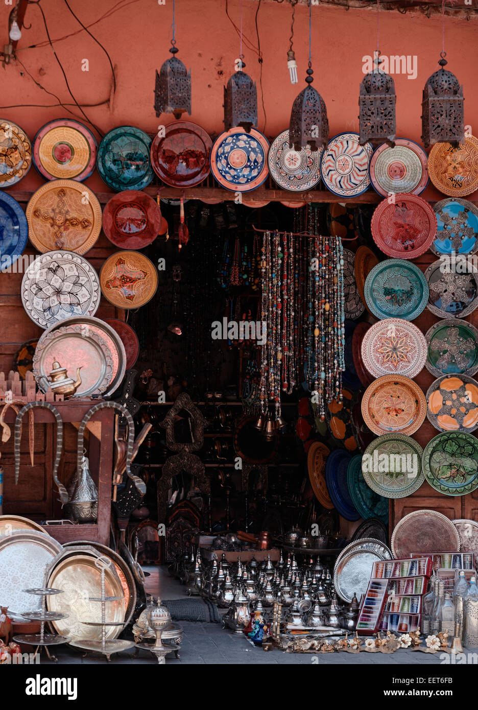 Porcelain and terracotta goods, plates, vases, metal lamps, on sale in ...