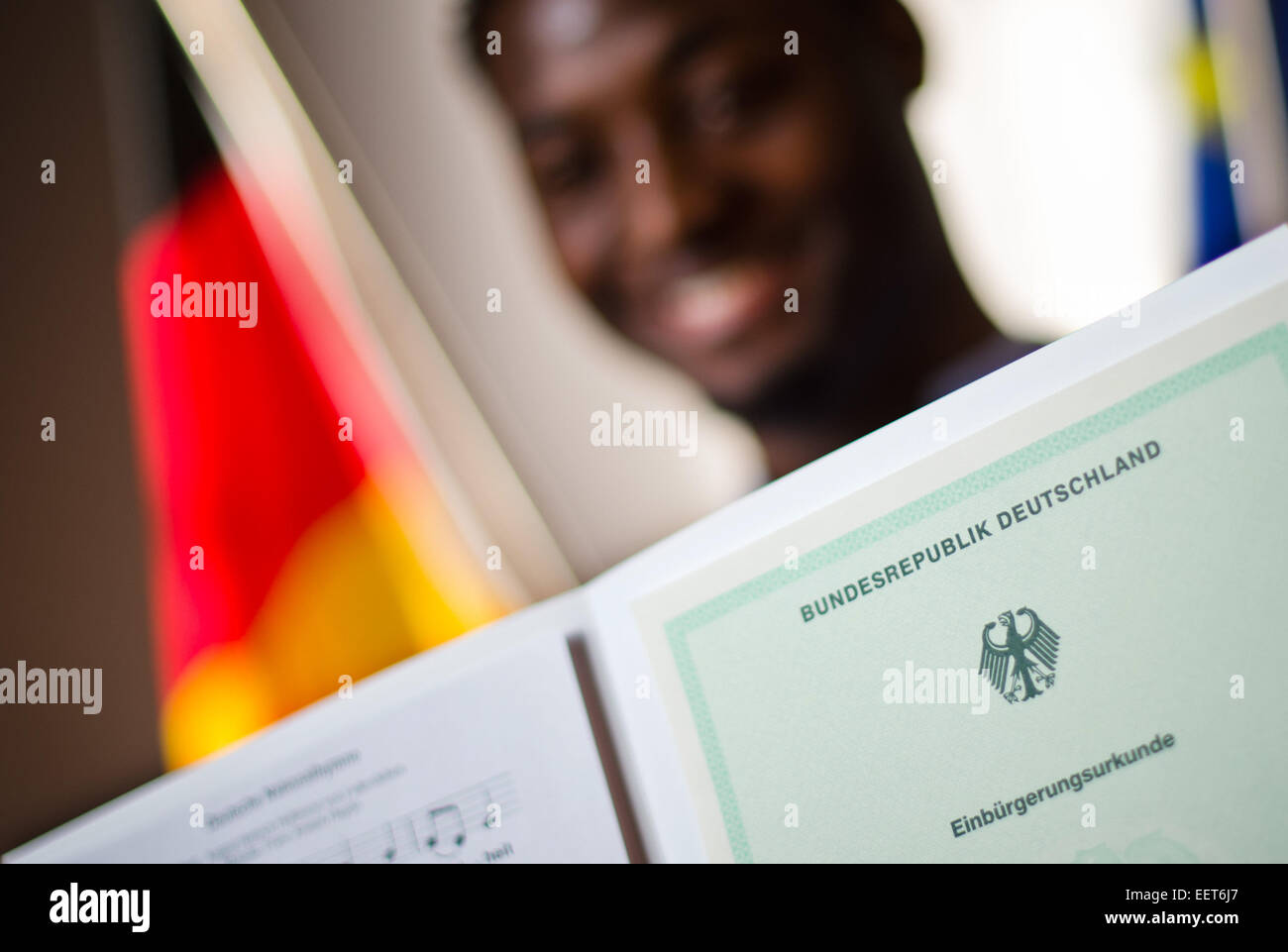 Hanover, Germany. 21st Jan, 2015. A man from Cameroon poses with a ...