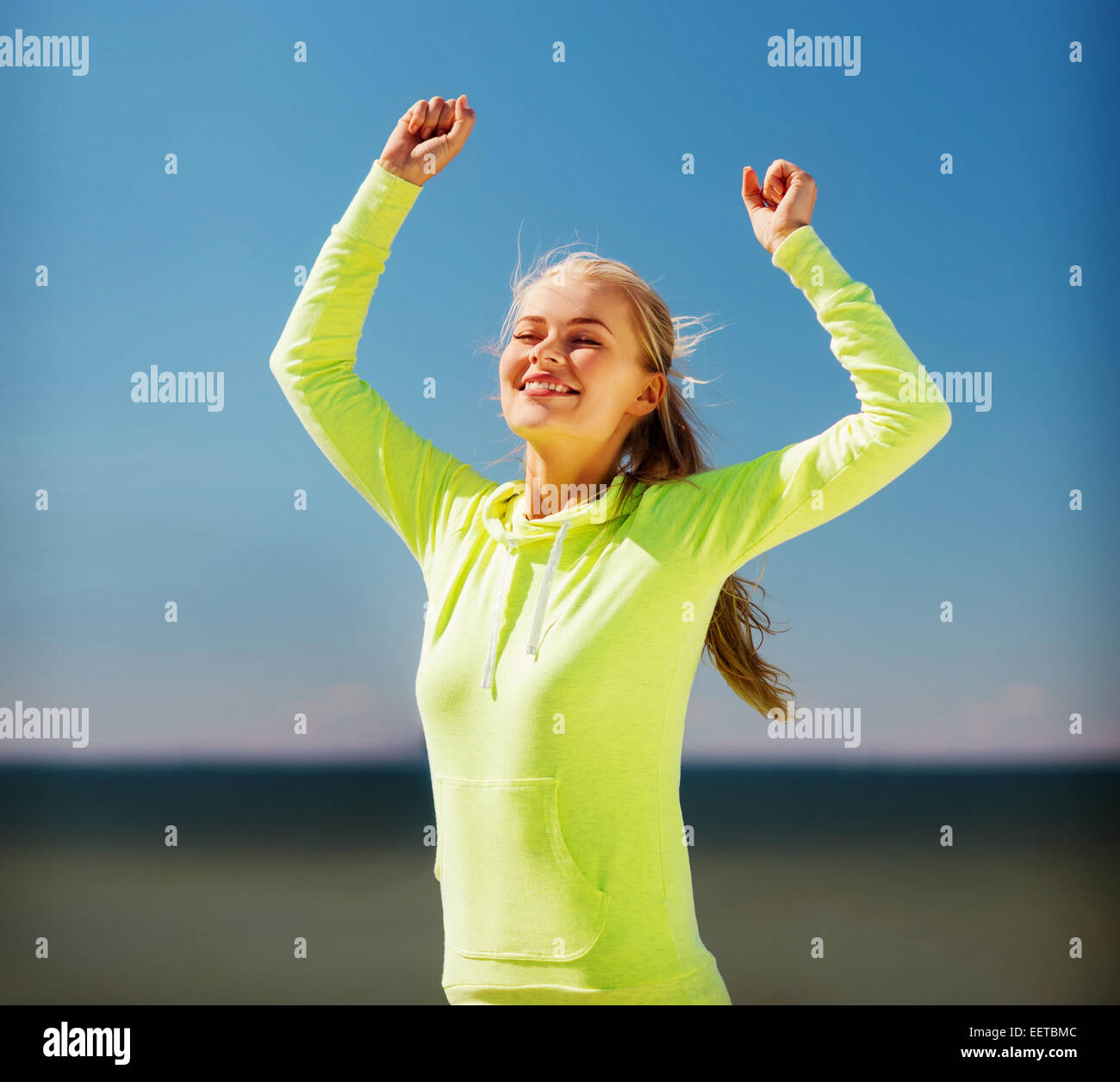 woman runner celebrating victory Stock Photo - Alamy