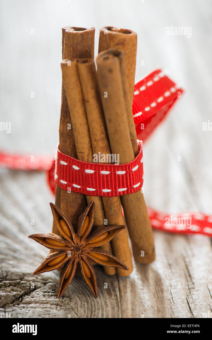 Christmas spices on wooden background Stock Photo - Alamy