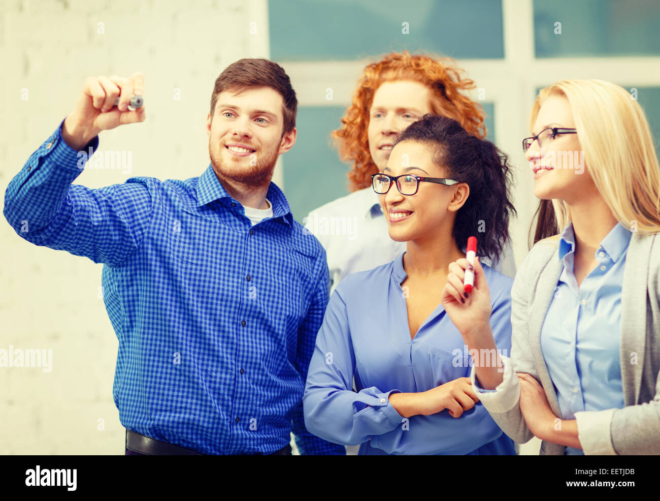 Creative team writing hi-res stock photography and images - Alamy