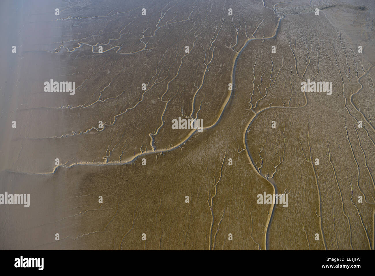 An abstract aerial view of mudflats on the Bristol Channel near Burnham ...