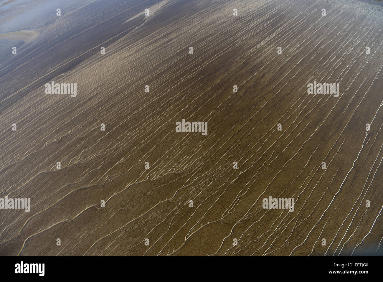 An abstract aerial view of mudflats on the Bristol Channel near Burnham ...