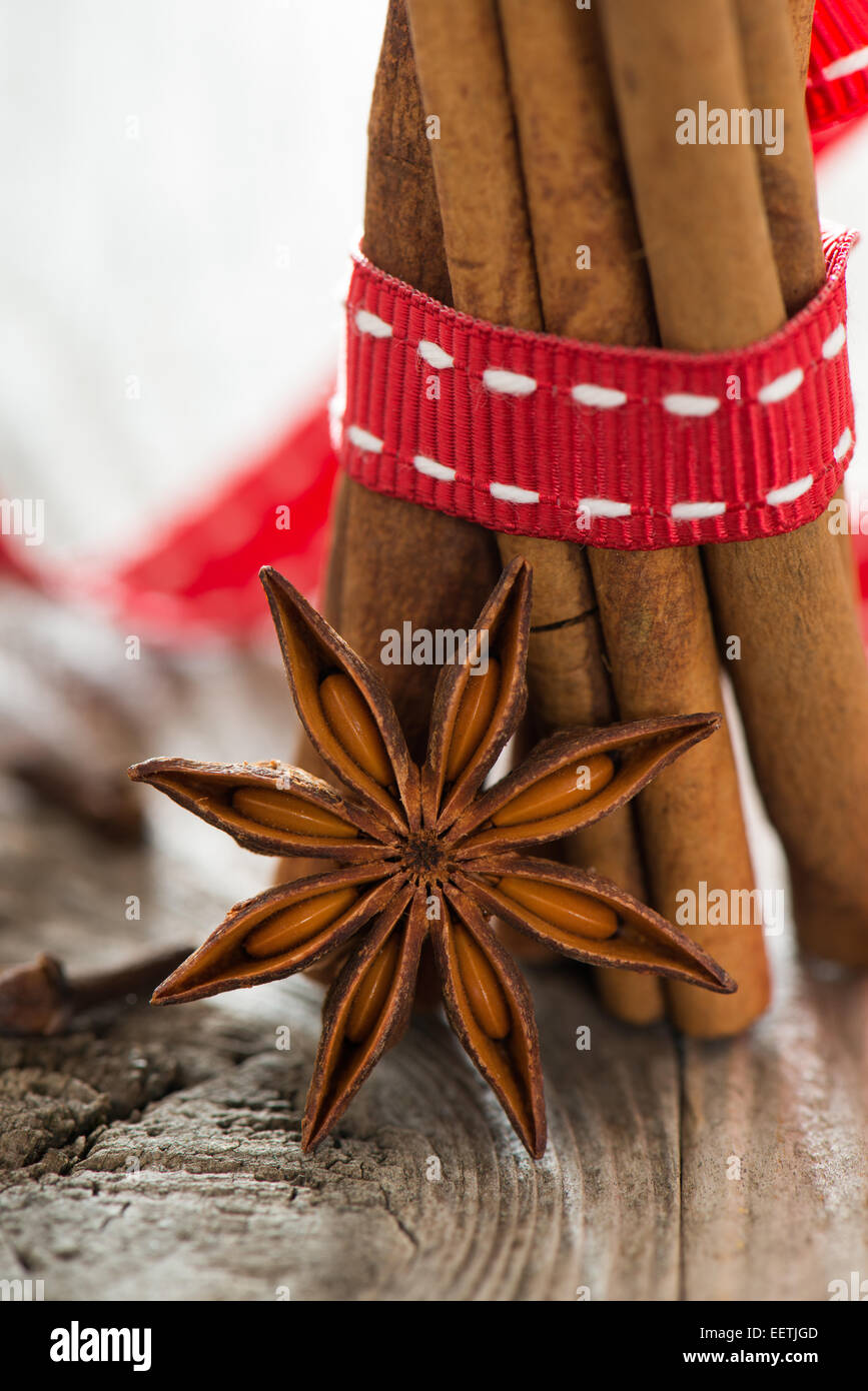 Christmas spices on wooden background Stock Photo - Alamy