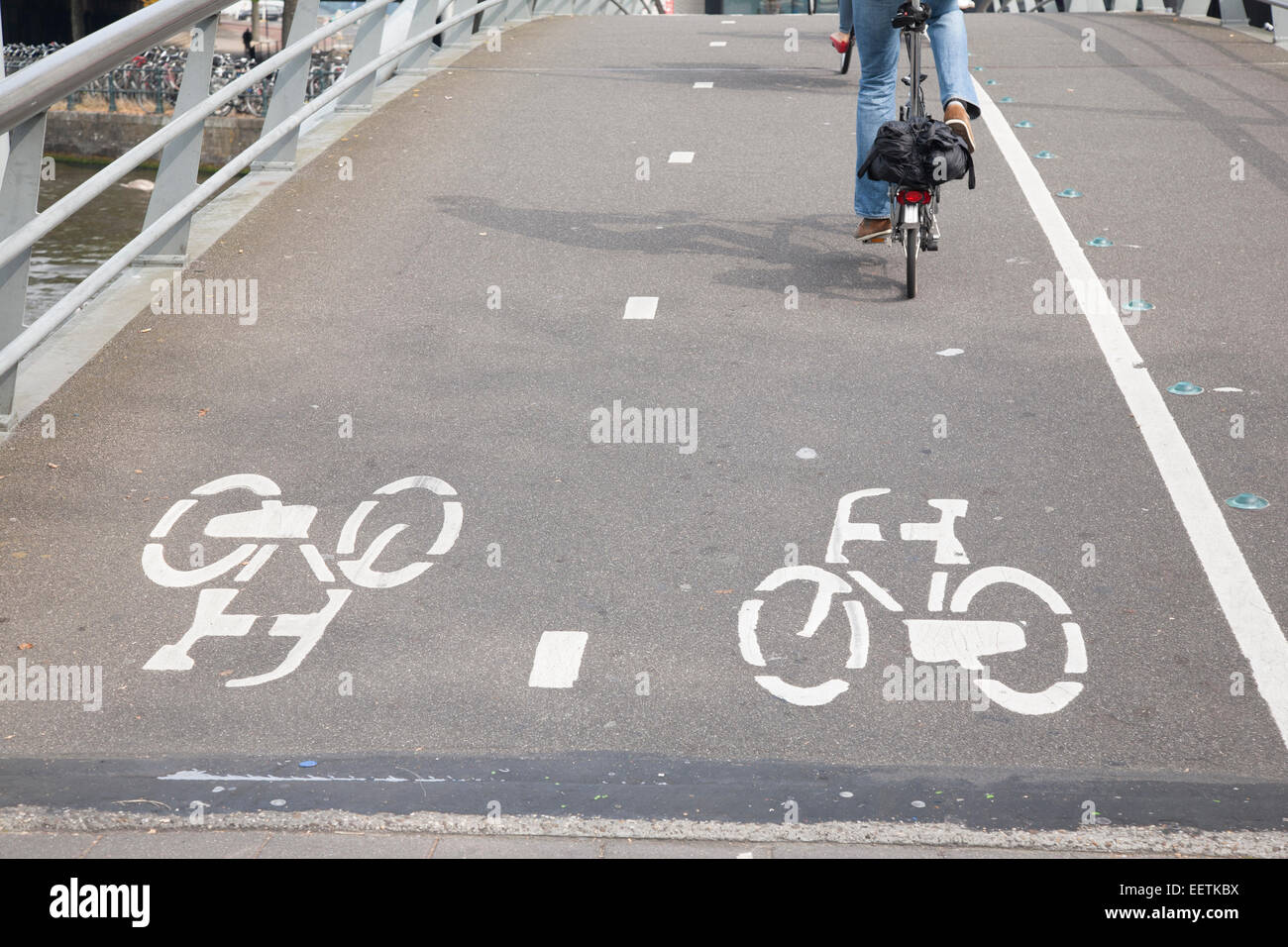 Cyclists on Bike Lane in Amsterdam, Holland, Netherlands Stock Photo ...