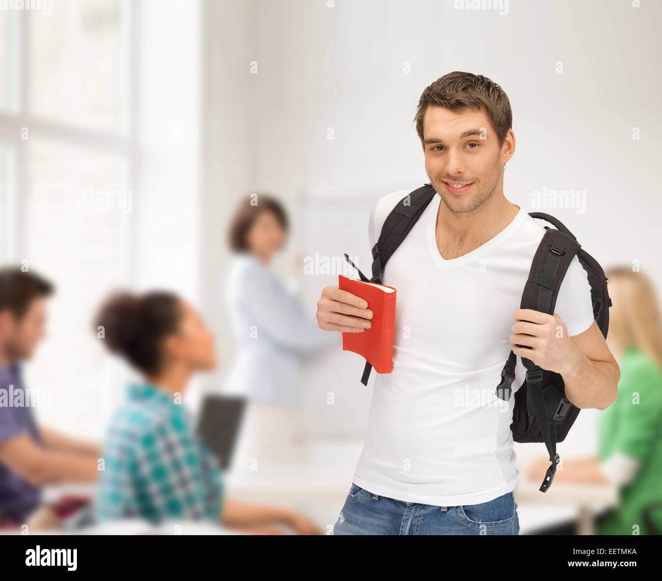 travelling student with backpack and book Stock Photo - Alamy