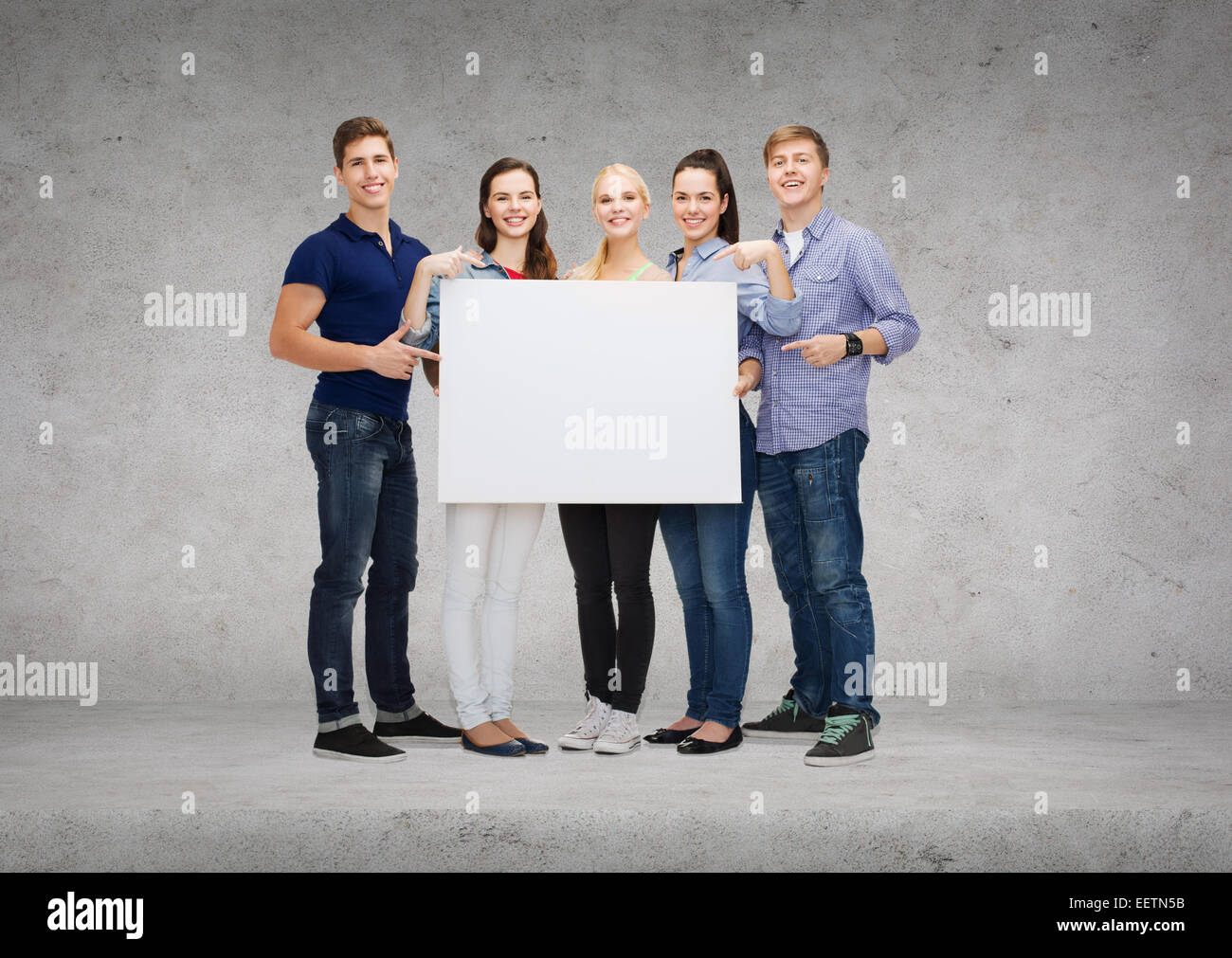 group of smiling students with white blank board Stock Photo - Alamy
