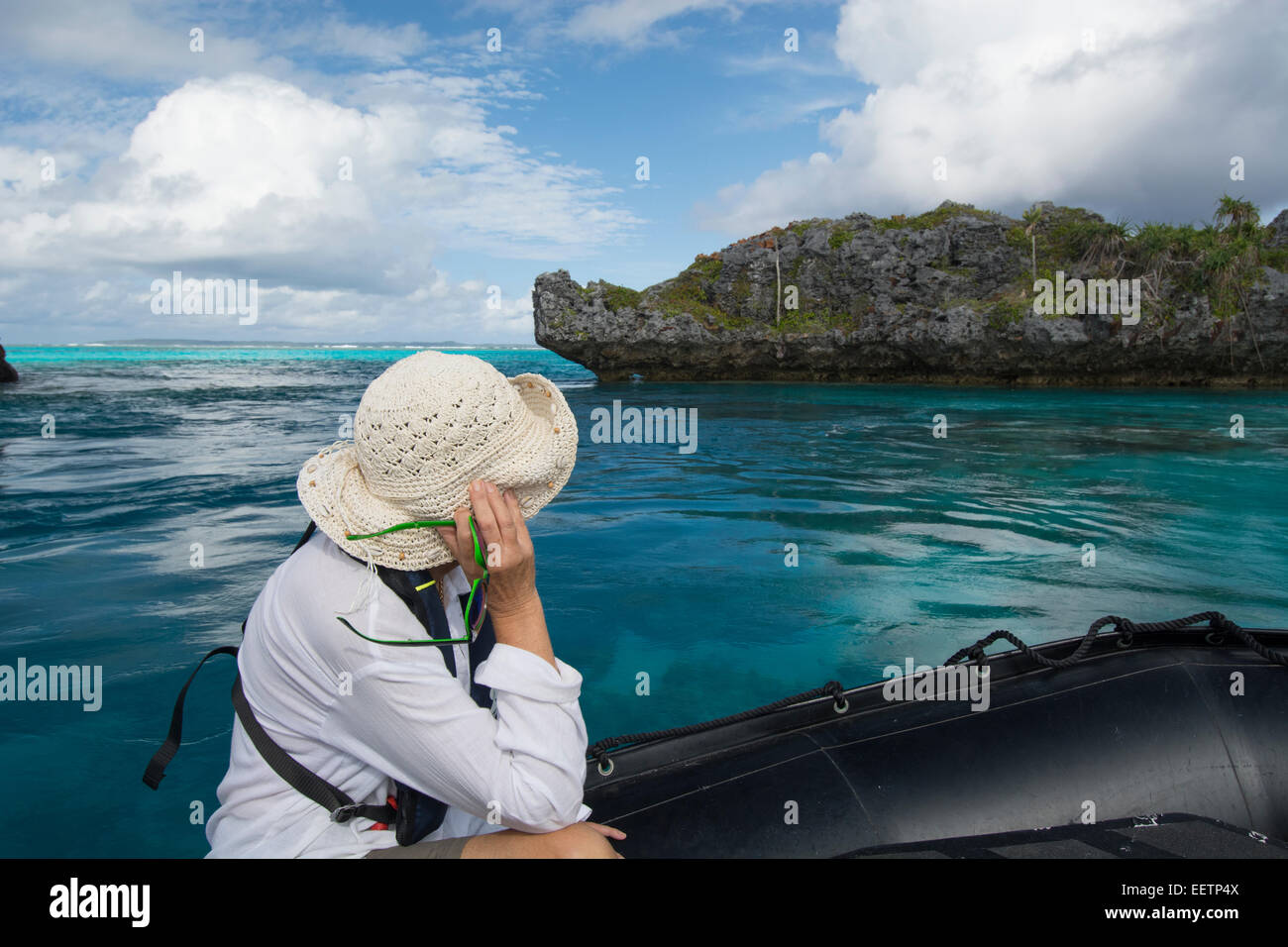 Fiji, Southern Lau Group, Island of Fulanga. Tourists in zodiac ...