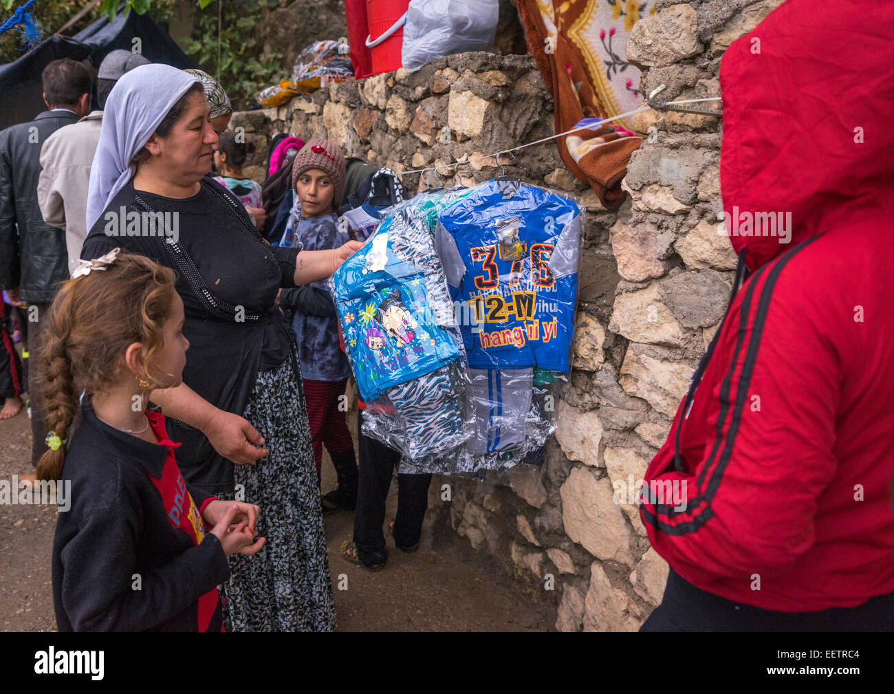 Helping poor middle east hi-res stock photography and images - Alamy