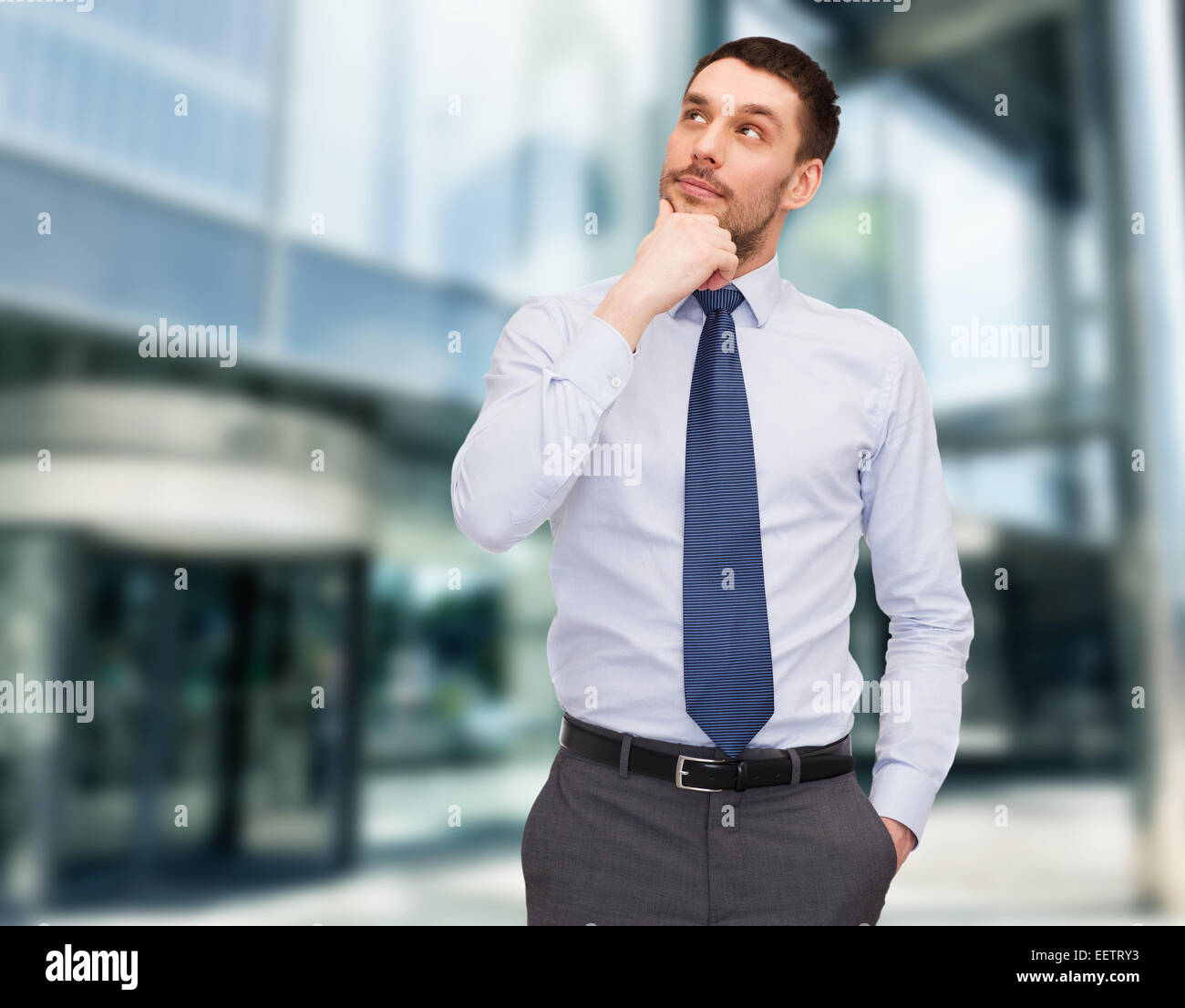 handsome businessman looking up Stock Photo - Alamy