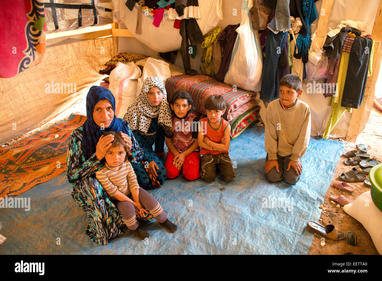 Syrian refugee family in tent, Bekaa Valley, Lebanon Stock Photo - Alamy