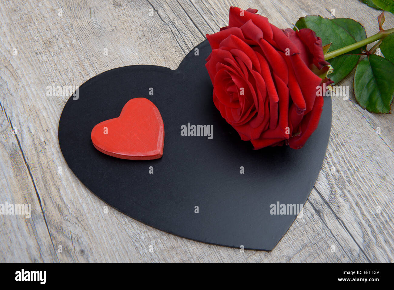 black and red hearts with rose for Valentine's Day Stock Photo - Alamy
