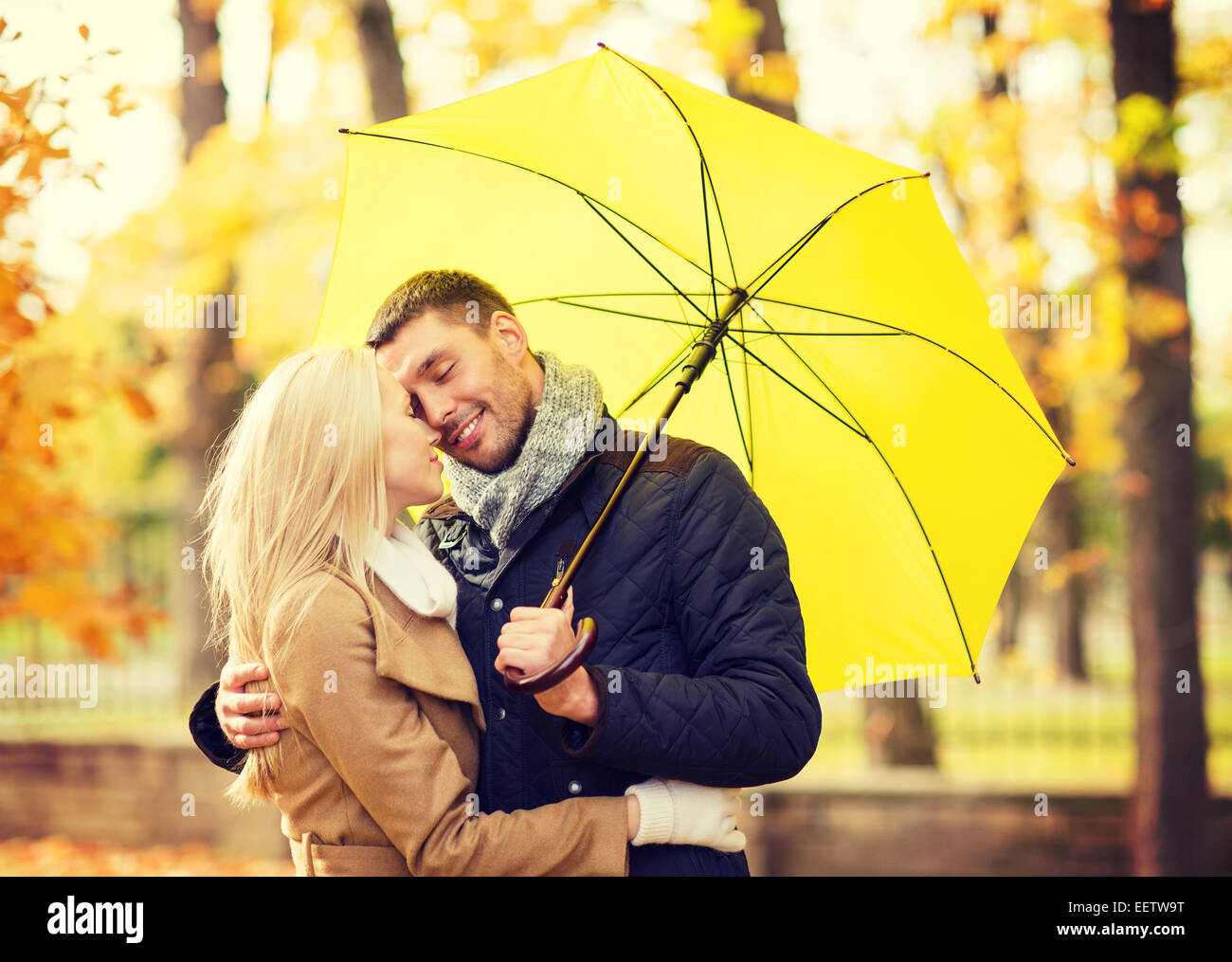romantic couple kissing in the autumn park Stock Photo - Alamy
