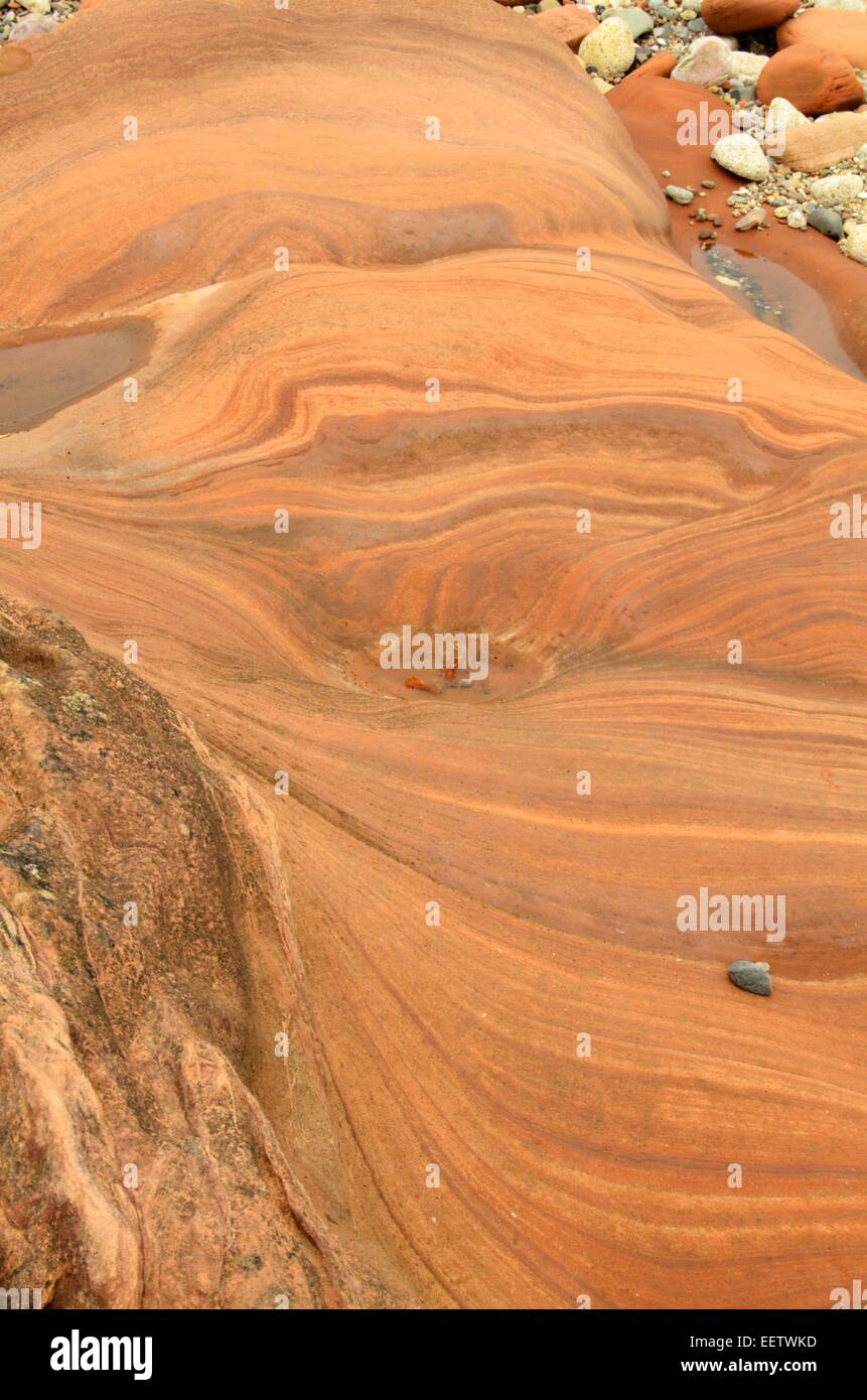 Sandstone on the shoreline at Corrie on the Isle of Arran, Scotland ...