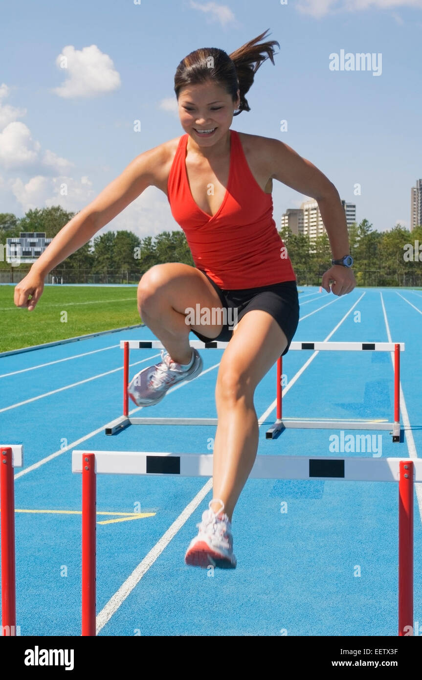 Motivation jump hurdles hi-res stock photography and images - Alamy