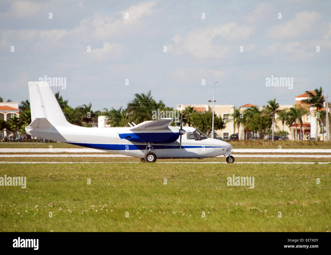 Side view of old propeller driven airplane on the ground Stock Photo ...