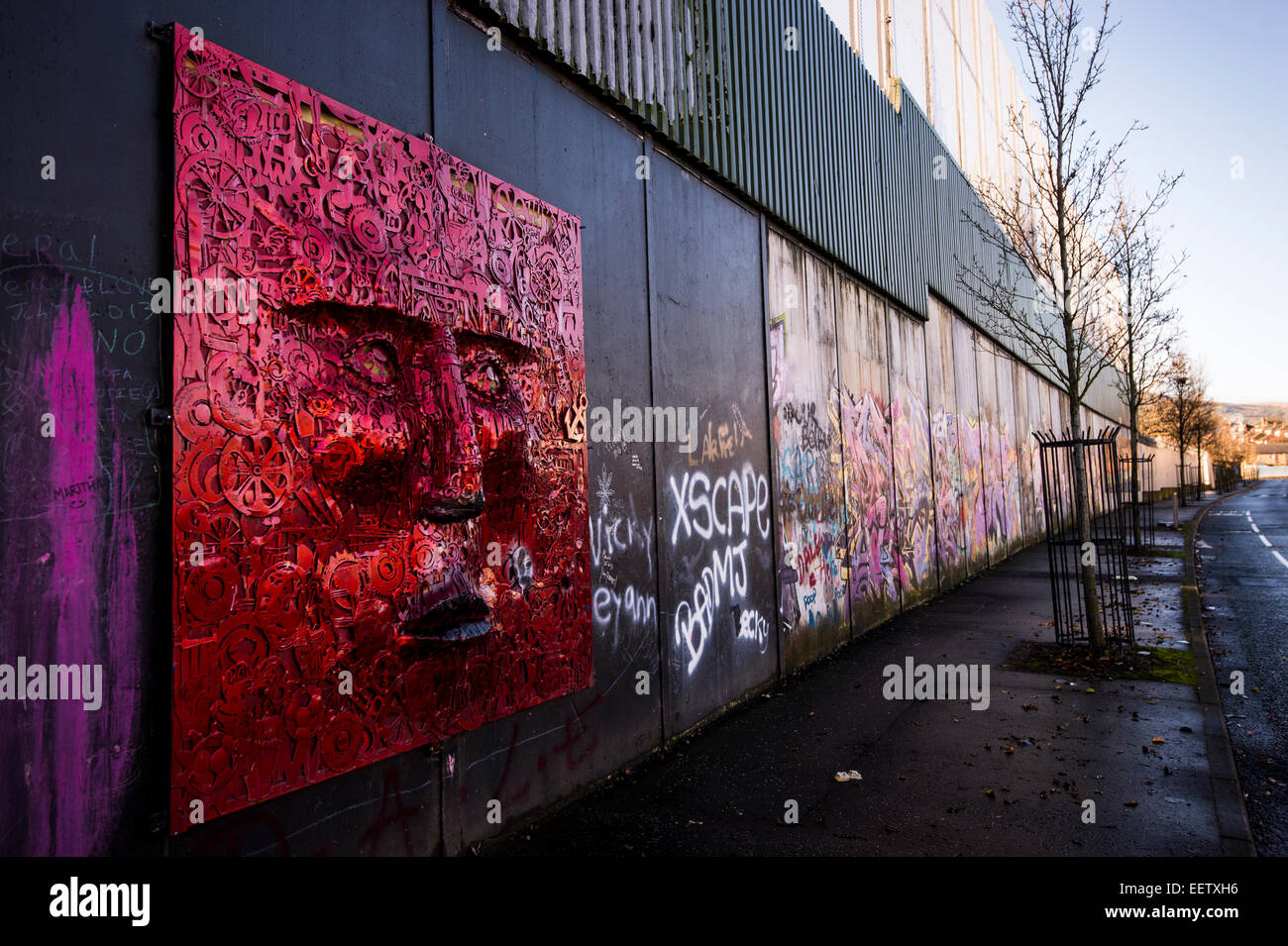 Art and sculptures along the peace wall between the Catholic and ...