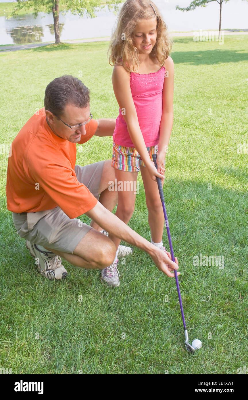 Family golf lessons hi-res stock photography and images - Alamy