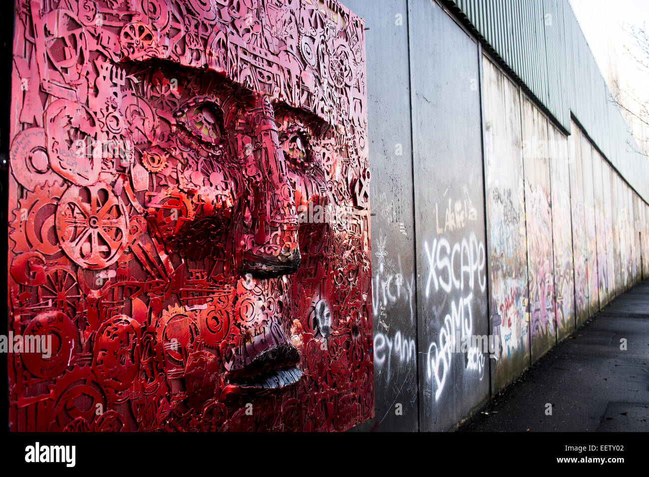Art and sculptures along the peace wall between the Catholic and ...
