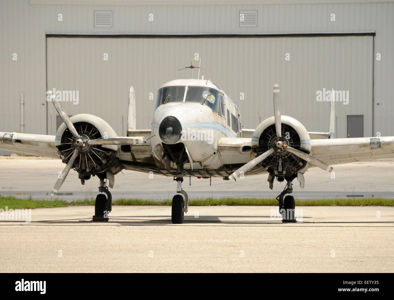 Vintage propeller airplane now in decay Beech 18 Stock Photo - Alamy