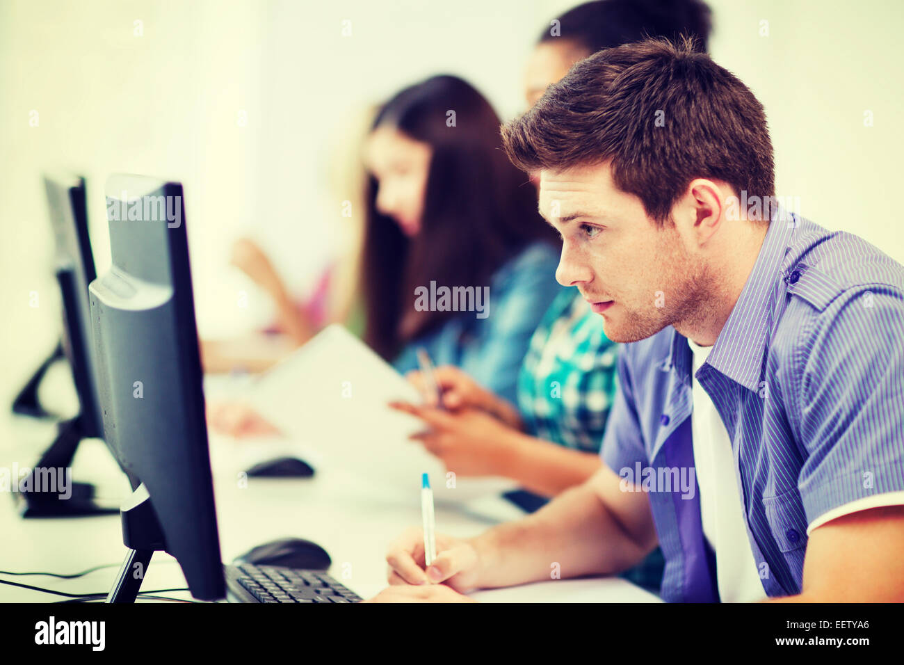 student with computer studying at school Stock Photo - Alamy