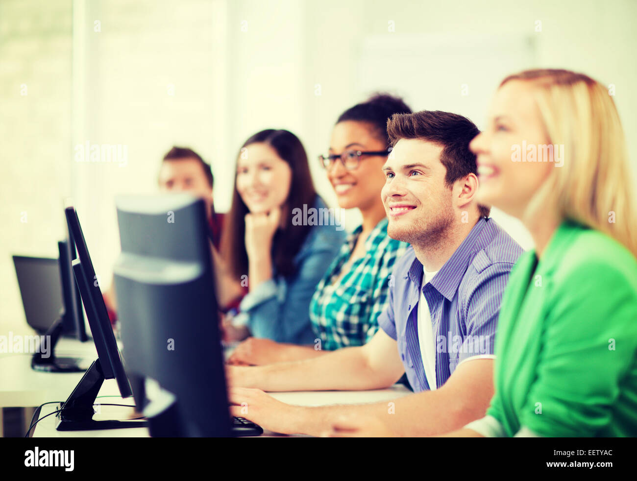 students with computers studying at school Stock Photo - Alamy