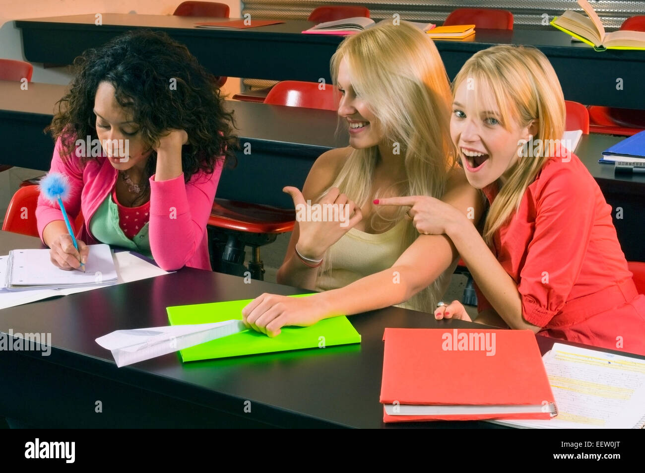 Female college students in a classroom Stock Photo - Alamy