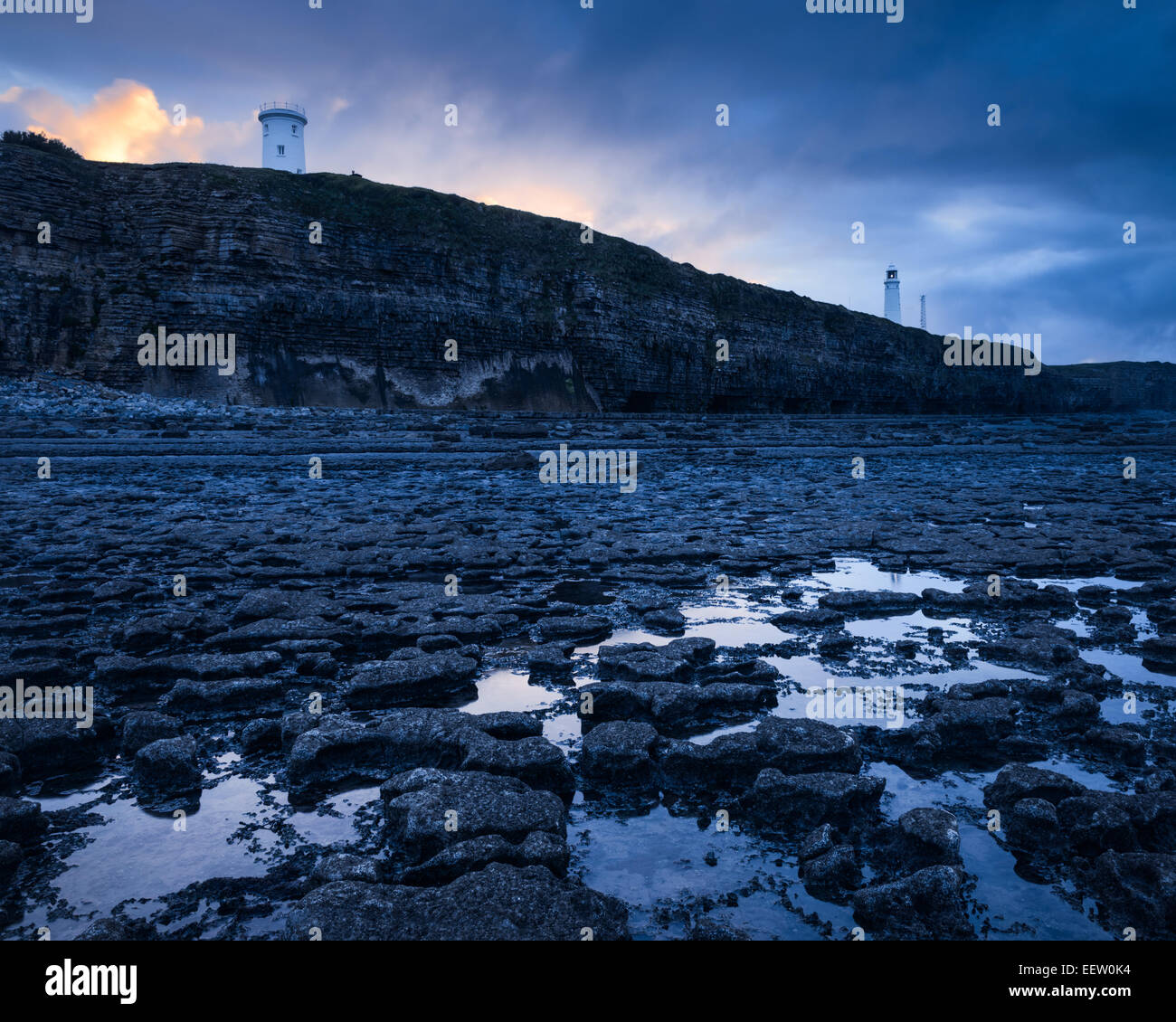 The lighthouse and tower on the cliffs of Ogmore at Nash Point in south ...