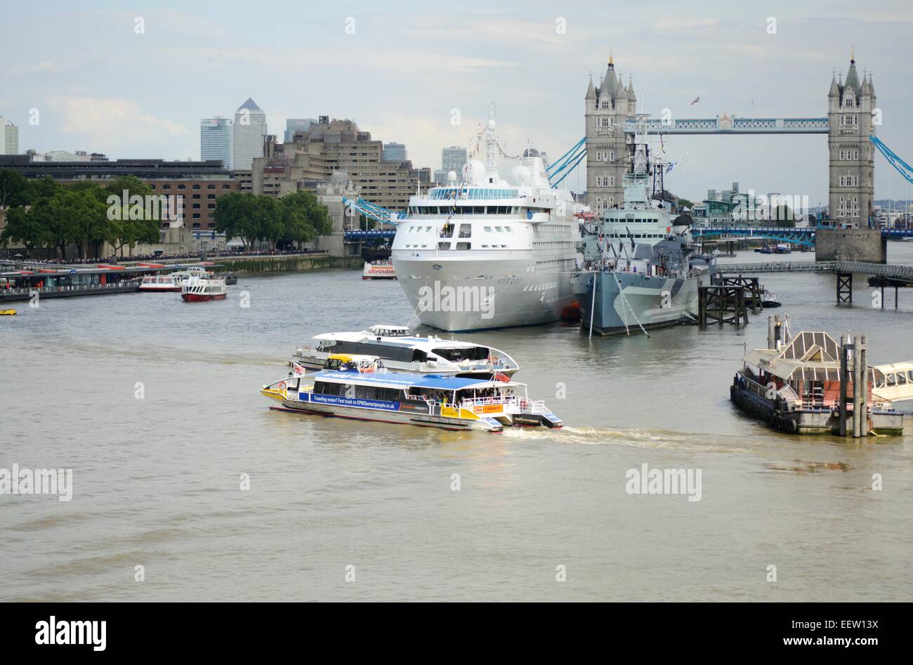 Cruiser ship moored alongside the HMS Belfast in London, England Stock ...